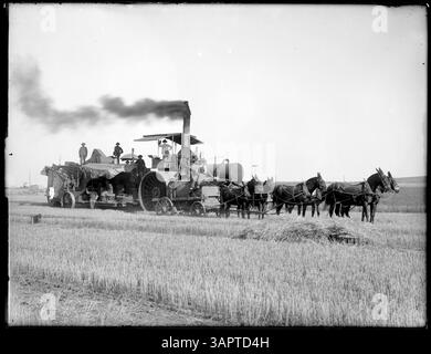 This photograph by Lee Moorhouse shows a steam tractor pulling a ...