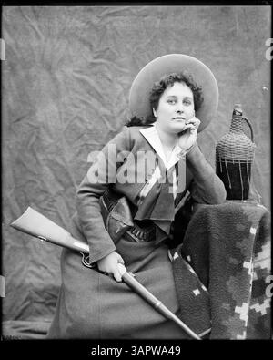 This photograph, from the Lee Moorhouse collection, shows people ...