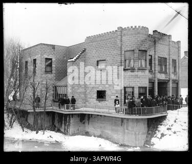 A photograph documenting the construction of a cultural building by the ...