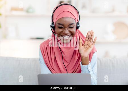 Teleconference. Smiling Young Muslim Woman Making Video Call With ...