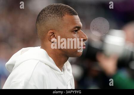 Real Madrid CF’s Kylian Mbappe (R) and Valencia CF’s Cesar Tarrega ...