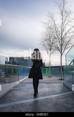 Pathway surrounded by leafless trees in the middle of a park Stock ...