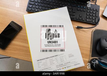 UN 3481 battery warning label sign on recycling box package, lithium ...