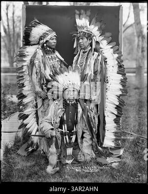 This photograph shows Yakima Indians wearing traditional regalia ...
