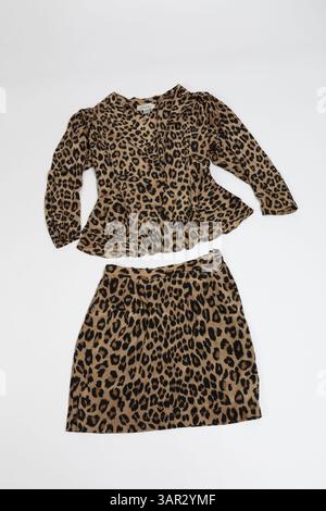This leopard print skirt suit by Argenti was worn by John Chaney, known ...