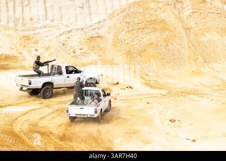 Arron Taylor and Theo James filming Fuze in a Quarry in Kent Stock ...