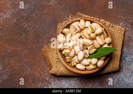 Fresh pistachios, showcasing their vibrant green color and unique ...