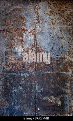 Old age, vintage, metal corrosion, layers of old peeling paint on an ...