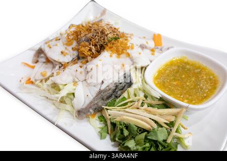 Die cut of Steam Red Snapper fillet with seafood spicy dipping on white ...