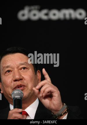 NTT DOCOMO Inc. President and CEO Kazuhiro Yoshizawa speaks during a ...