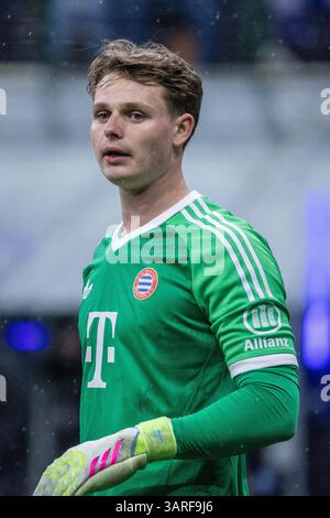 Jonas Urbig in action during the UEFA Champions League last 16 first ...