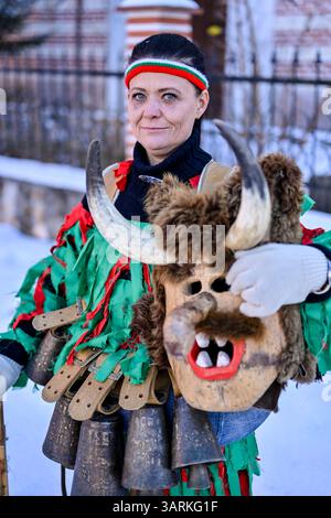 This striking portrait captures a Kuker wearing a traditional hand ...