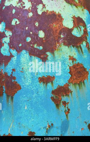 Heavily weathered metal background - Rusted iron surface with eroded ...