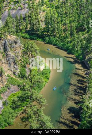 boaters fishing on the blackfoot river in a canyon near ovando, montana ...