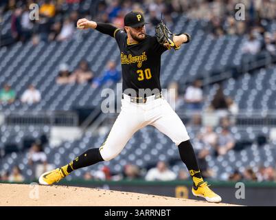 Pittsburgh Pirates starting pitcher Paul Skenes heads in from the ...