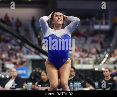 UCLA's Brooklyn Moors competes on the floor during an NCAA gymnastics ...