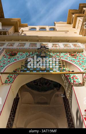Arch with an entrance the City palace of Udaipur in India Stock Photo ...