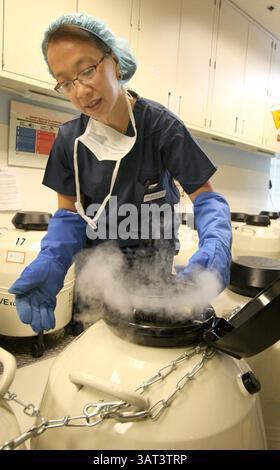 Nancy Huen, left, the in vitro fertilization lab supervisor, and ...