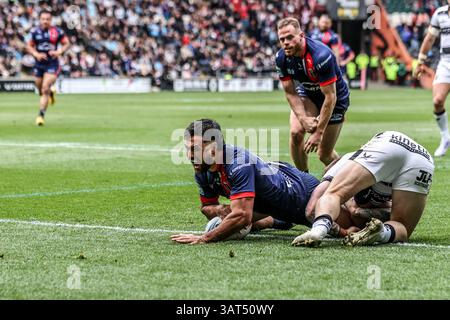 Peta Hiku of Hull KR goes over for a try during the Betfred Challenge ...
