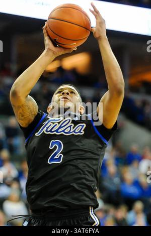 Tulsa guard Pat Swilling Jr. (2) drives past Creighton guard Jahenns ...
