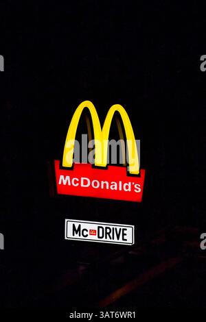 A picture of the neon sign of a McDonald's Stock Photo - Alamy