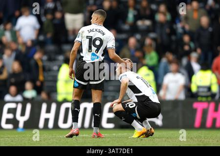 Derby County's Kayden Jackson (right) and Stoke City goalkeeper Viktor ...