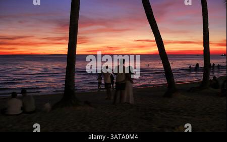 Vacationers enjoy the scenic sunset and tranquil waters at Boracay ...