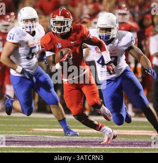 Fresno State's Isaiah Burse picks up a first down against Boise State ...
