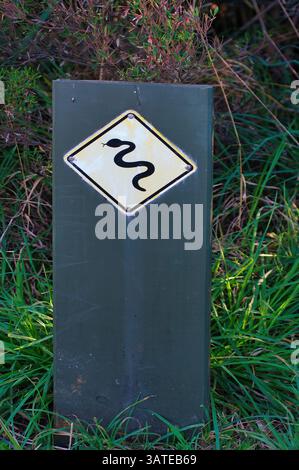 Sign warning of dangerous snakes in Zaibaikal National Park beside Lake ...