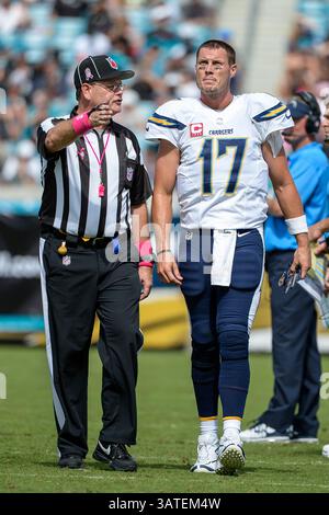 Head linesman Jerry Bergman (91), back judge Rich Martinez (39), field ...