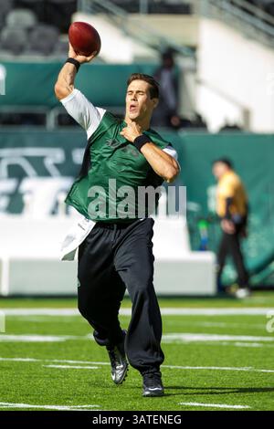 New York Jets quarterback Brady Cook warms up before an NFL football ...