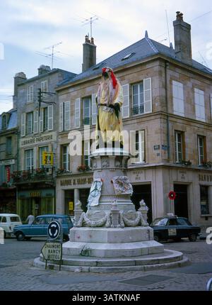 A statue of Denis Diderot in a square of the medieval town of Langres ...