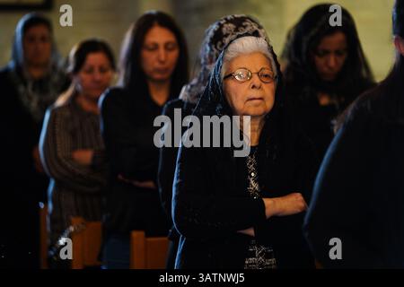 Alqosh, Iraq. 18th Apr, 2025. Clergy carrying the coffin of Christ ...