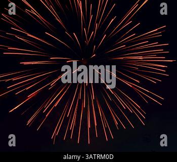 Firework streaks in the night sky Stock Photo - Alamy
