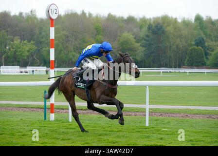 Tiny Tetley ridden by jockey Callum Pritchard on their way to winning ...
