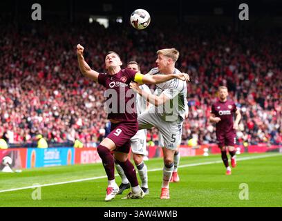 Aberdeen's Mats Knoester and Heart of Midlothian's Tomas Magnusson battle for the ball during ...