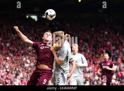 Aberdeen's Mats Knoester and Heart of Midlothian's Tomas Magnusson battle for the ball during ...