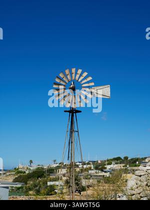 Classic vintage style windmill used on farms Stock Photo - Alamy