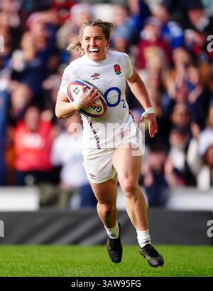 England's Claudia MacDonald breaks clear to score a try during the ...