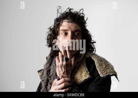 Hamlet in modern grunge or post-apocalyptic reinterpretation, young man ...