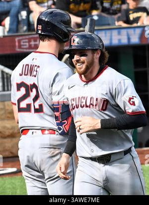 Cleveland Guardians' Daniel Schneemann scores on a wild pitch by ...