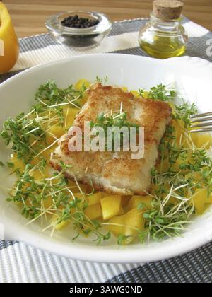 Fish on peppers and cress Stock Photo - Alamy