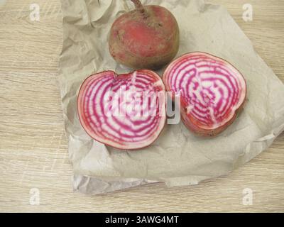 One whole and one halved Chioggia ringlet on paper Stock Photo - Alamy