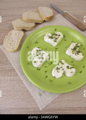 Cream cheese hearts with cress sprouts Stock Photo - Alamy
