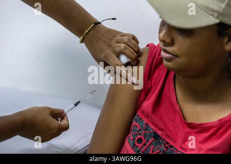 A woman gets a dose of yellow fever. Colombia's Government has declared ...