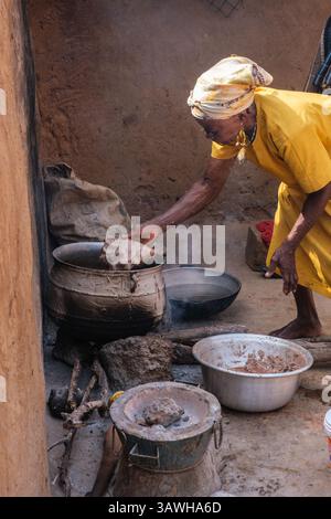 Ghana, Mognori. Shea Butter Production. Placing Shea Butter Fat in ...