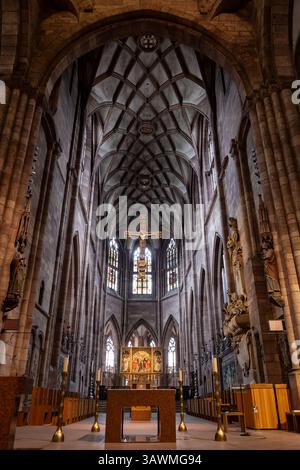 The interior and altar of the cathedral (minster) in Freiburg im ...