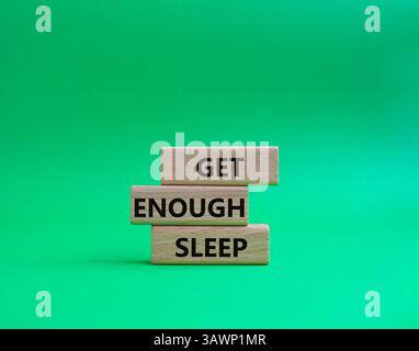 Get enough sleep symbol. Wooden blocks with words Get enough sleep ...