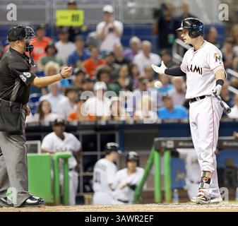 Home plate umpire Cory Blaser (89) calls a third strike in the seventh ...