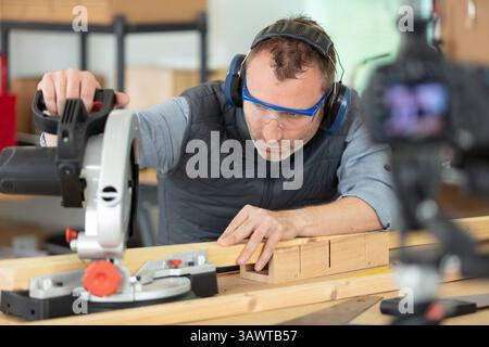 diy blogger recording video of woorworking hobby Stock Photo - Alamy